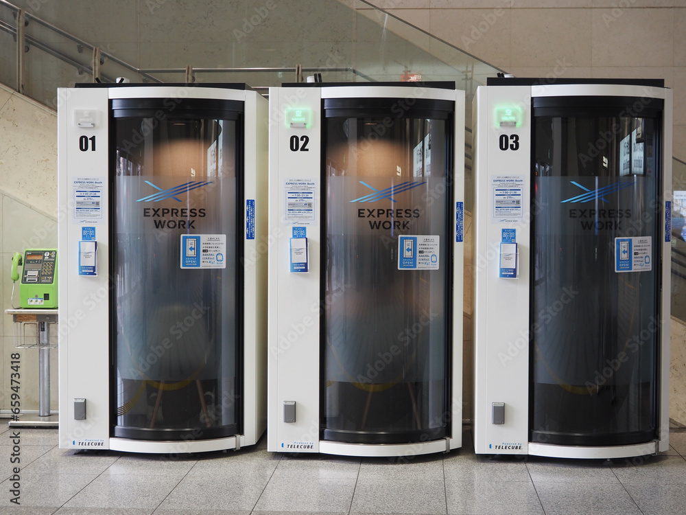 TOKYO, JAPAN - September 24, 2023: A row of Express Work booths inside ...
