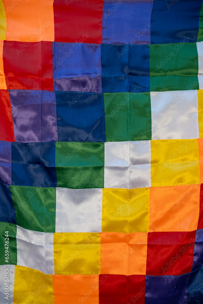 Close up image of a silk Wiphala Flag - a symbol commonly used to ...