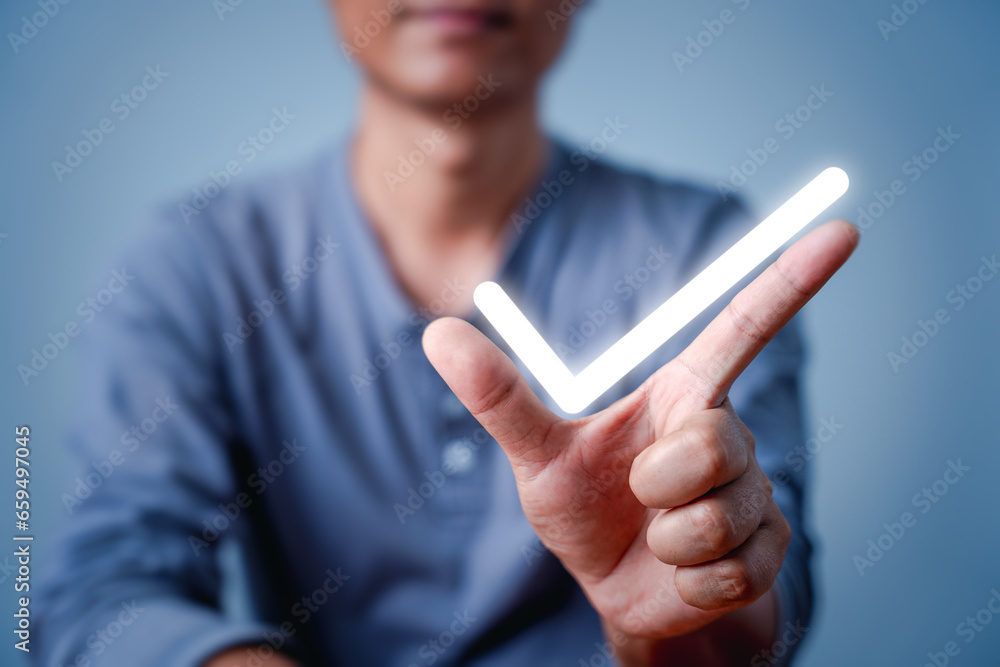 Hand with virtual glow correct sign and tick correct mark to approve ...