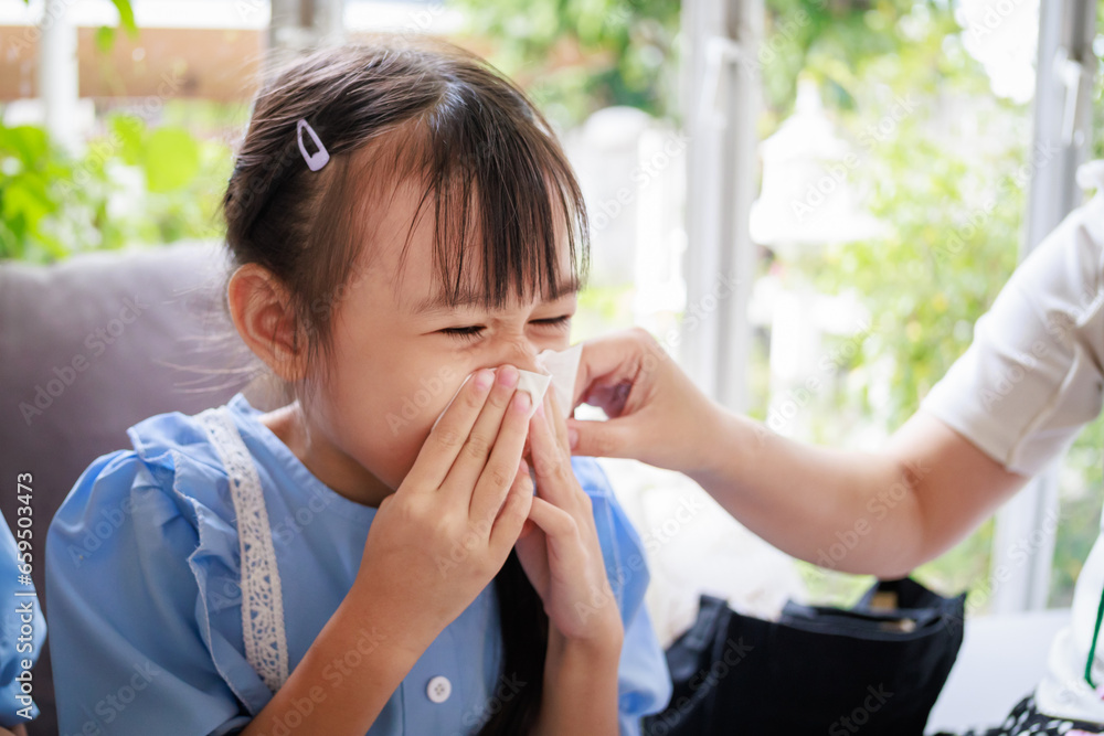 Kid covering her mouth while cough or sneeze. Concept of prevention covid-19 or coronavirus ...