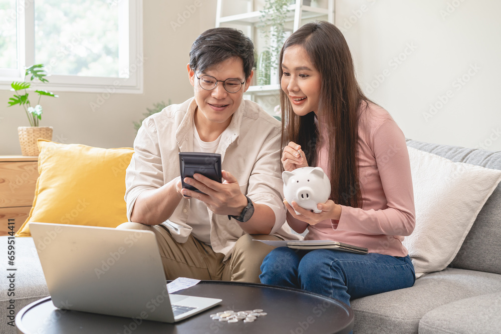 financial in family concept, Happy Asian husband and wife calculating ...