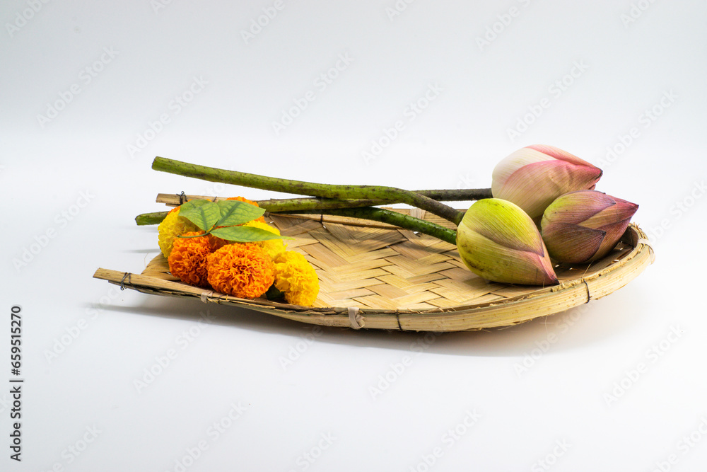 DECORATIVE KULO WITH LOUS FLOWER,MARIGOLD FLOWER. ISOLATED ON WHITE ...