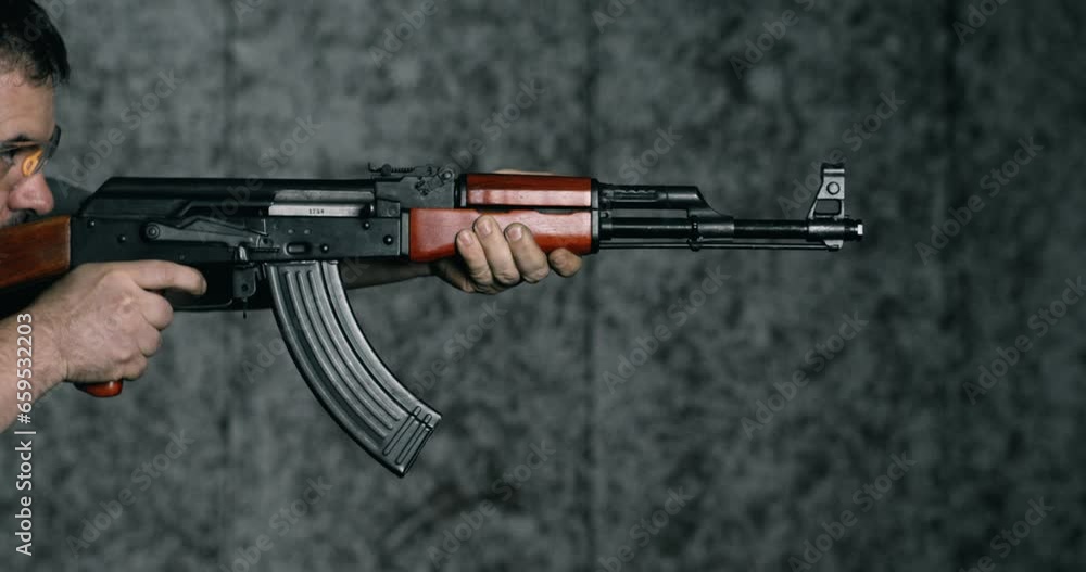 High-Speed 800fps Slow-Motion Shooting with AK-47, Side View of Man ...