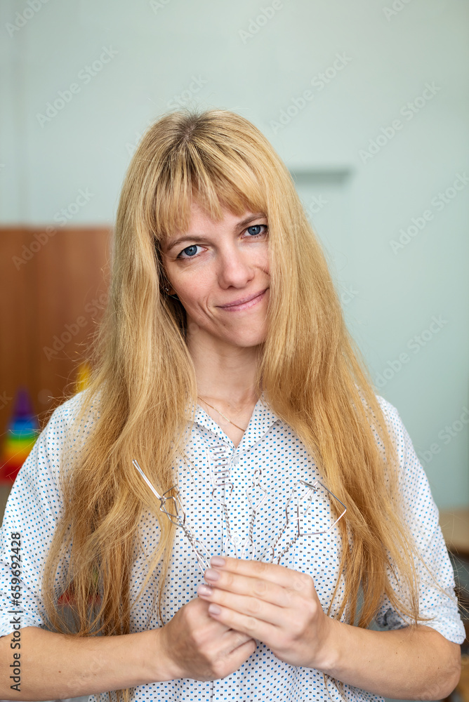 Speech therapist with logopedic probes. Set of logopedic probes for ...