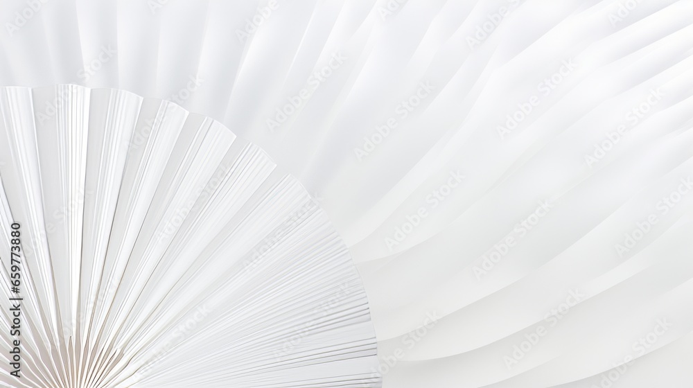 An elegant and minimalist image of a white paper fan on a light gray ...
