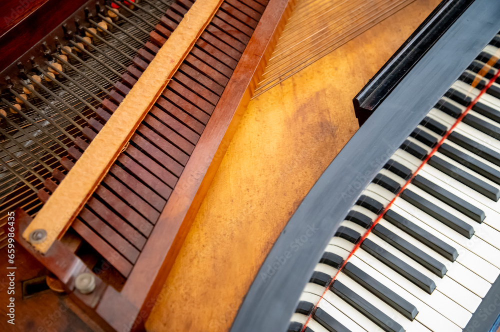 piano keys close up, pen classical piano showing the strings internal ...