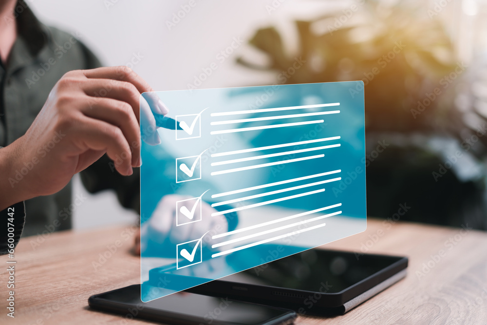 DMS, Document management system, and digital checklist concept, Businessman use tablets to check ...