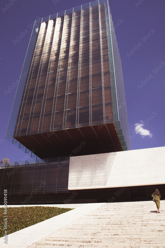 Madrid, Spain. July 1, 2022 Tall modern building with glass facade ...