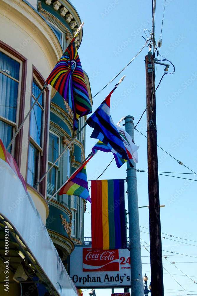 Vintage Coca Cola Sign and Pride Flag on historical building in San ...