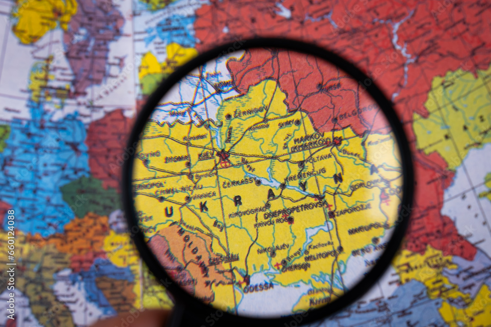 Zoom in on map of Ukraine with magnifying glass. Black magnifying glass ...