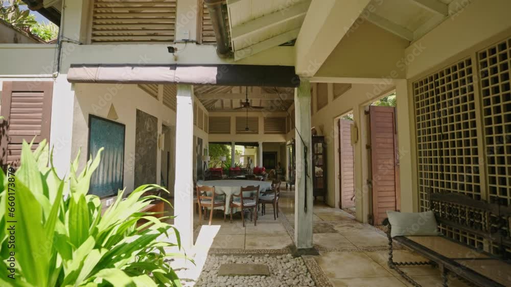 Living room with vintage furniture, horse statue and dining table in ...