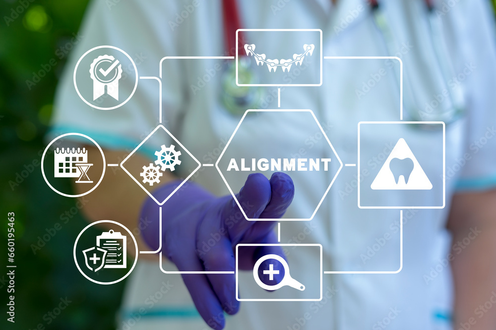 Dentist using virtual touch interface presses word: ALIGNMENT. Orthodontics cosmetic tooth ...