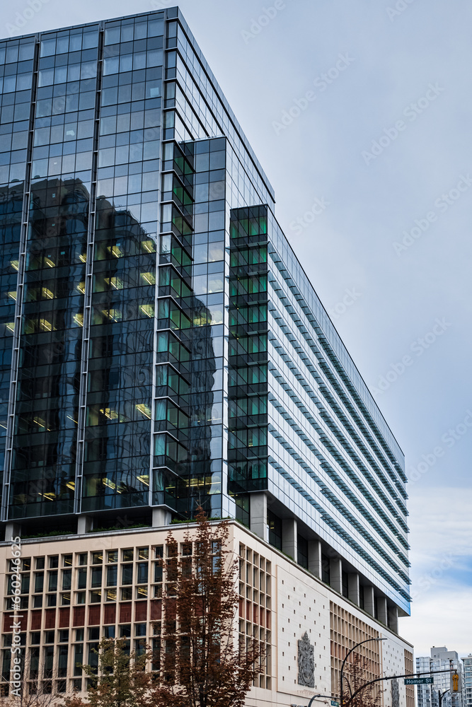 Modern apartment buildings in downtown Vancouver. Angular Glass Tower ...