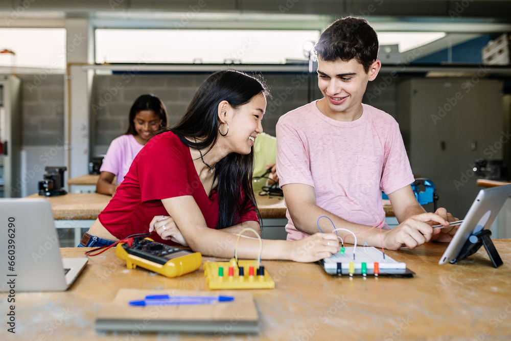 Young group of multiracial teenage students learning together ...