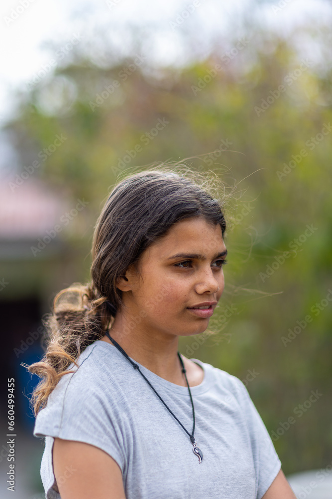 Portrait Of Young Aboriginal Girl In Vertical Format With Copy Space