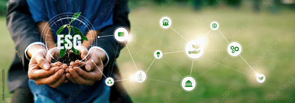 Stockfoto Businessman and little kid holding seedling plant together with ESG and eco icon ...