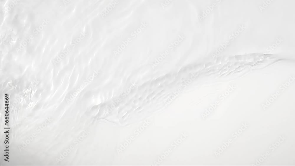 Pure beige water with reflections sunlight in slow motion. Water ...