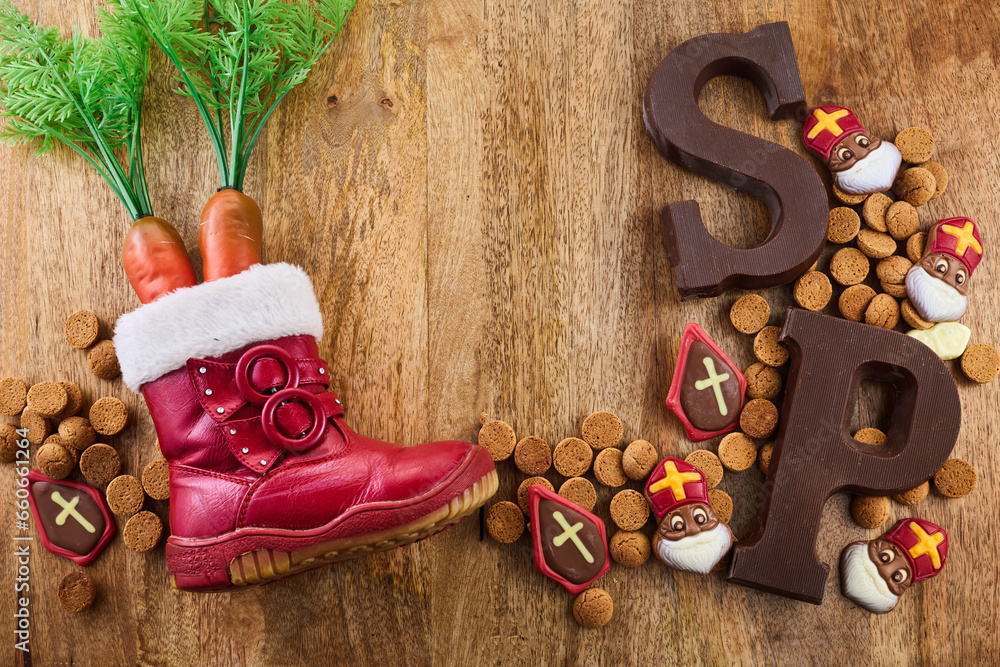 Dutch holiday Sinterklaas background. Children shoe with carrots ...