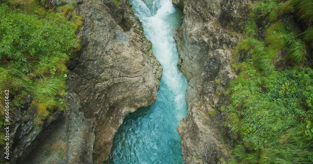Rapid flow of a mountain river in a deep stone gorge, Austria ...