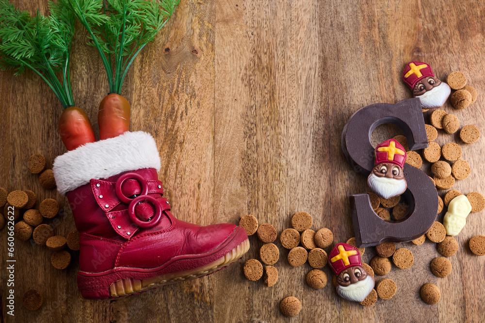 Dutch holiday Sinterklaas background. Children shoe with carrots ...