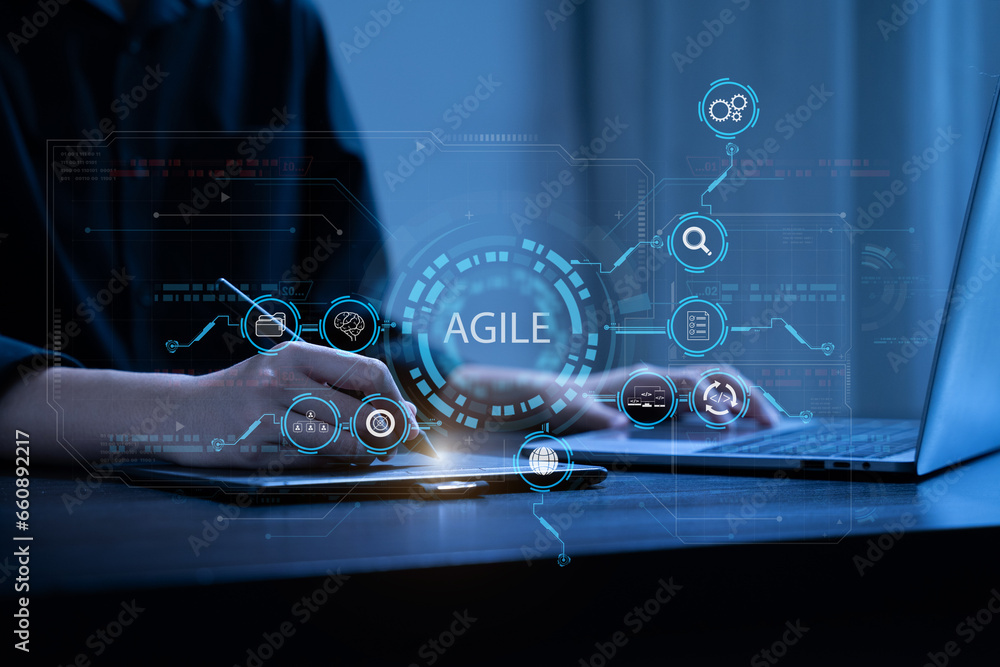 Agile development methodology concept. Business hand using laptop ...