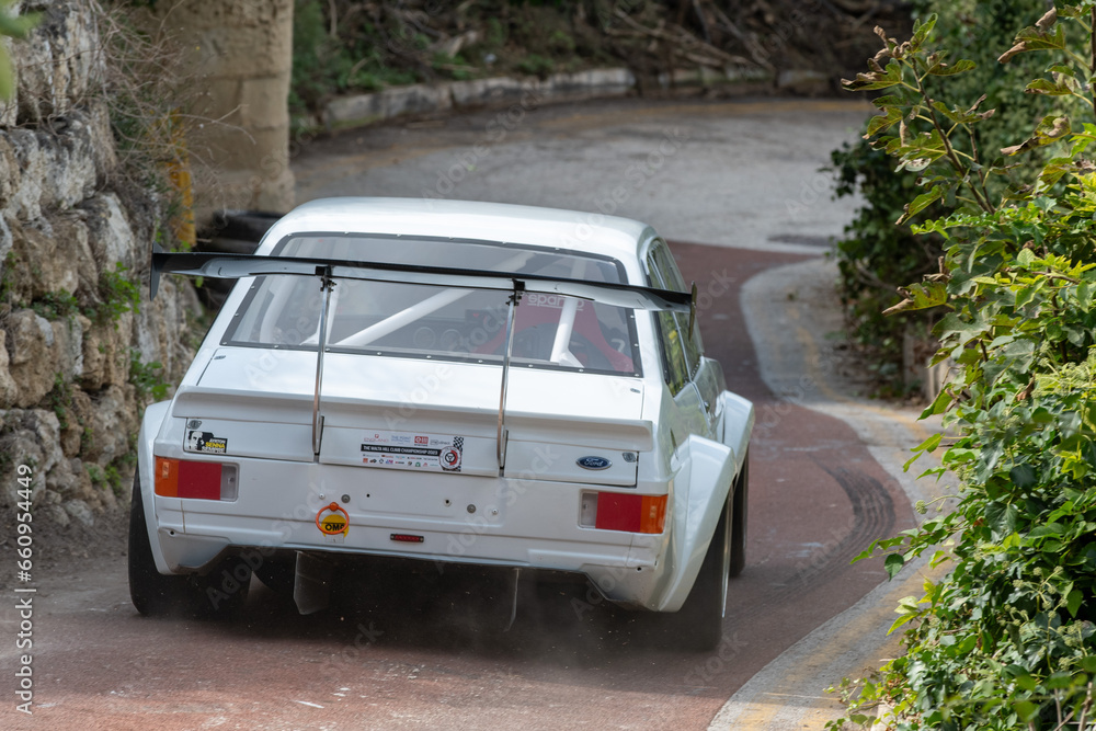 Preparations and qualifying races for drivers and cars on a road ...