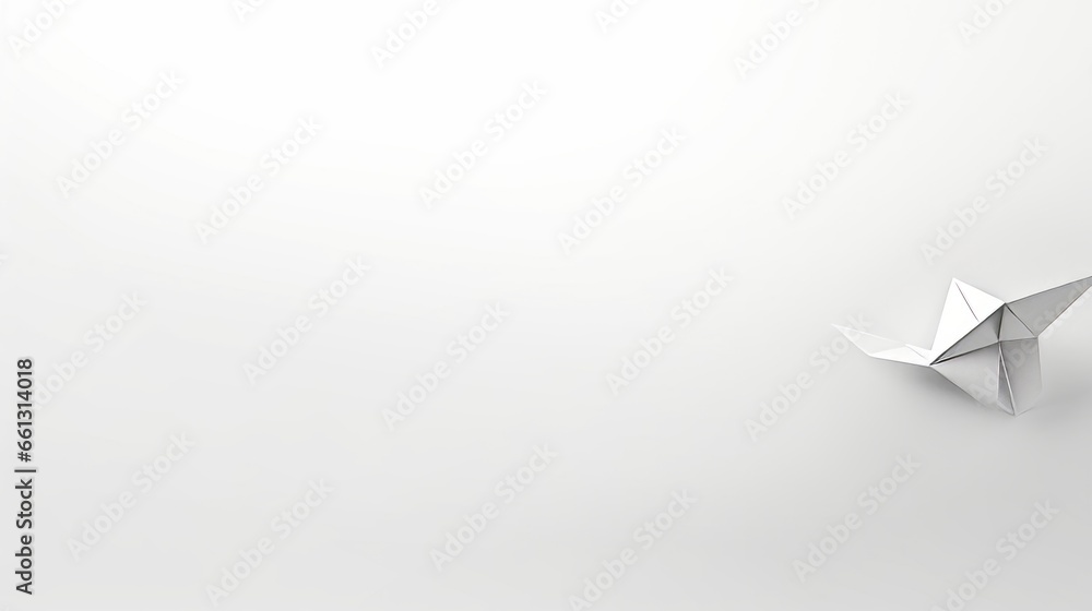 A white origami bird on a white background. The image shows the beauty ...