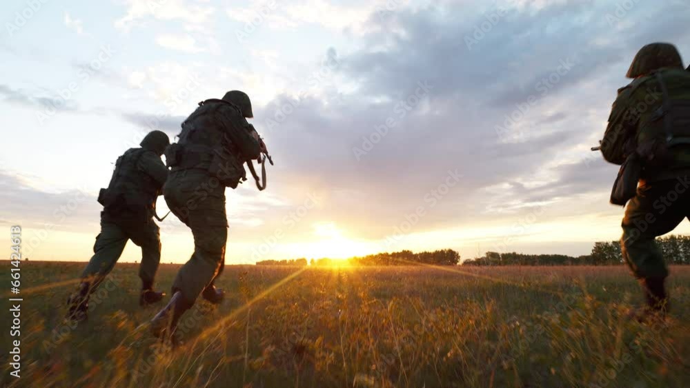 Armed squad of full equipped soldiers or security forces run to enemy ...