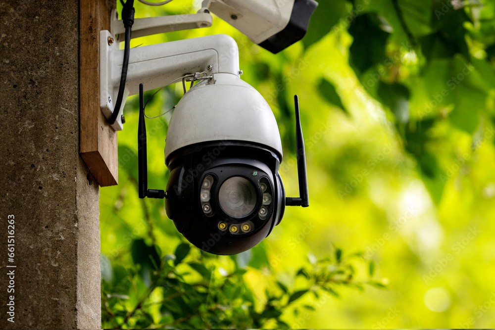 Online Security CCTV camera surveillance system outdoor of house. A ...