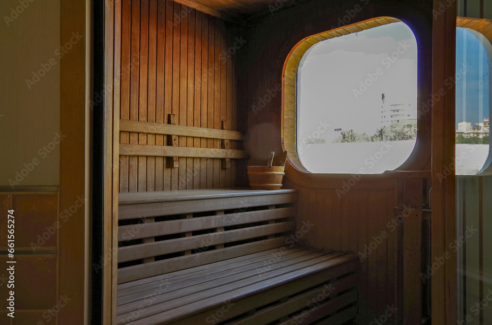 Finnish or dry sauna with oceanview or view of the sea inside male ...