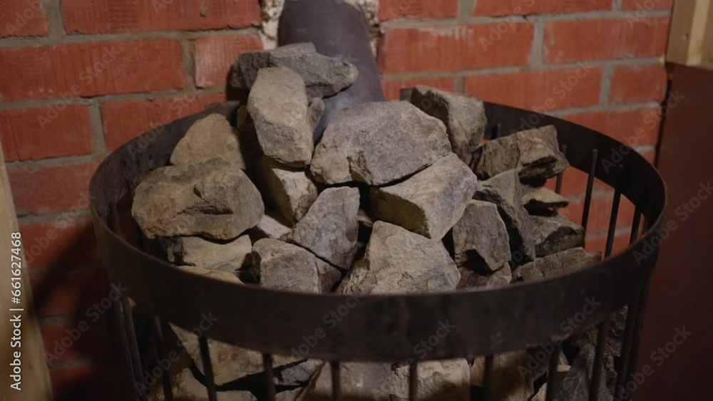 Stockvideo Stones in the oven to produce steam and heat in the steam ...