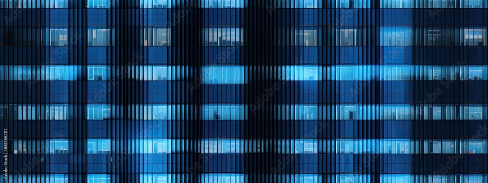 Seamless skyscraper facade with blue tinted windows and blinds at night ...