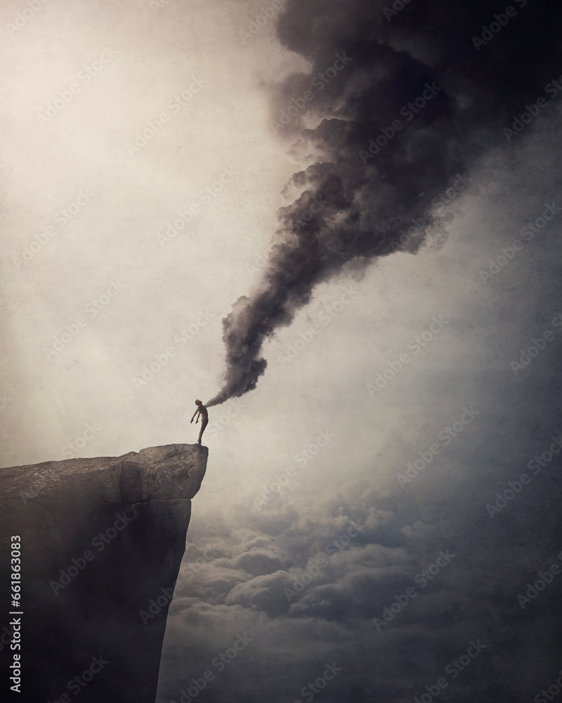 Deliver from evil conceptual scene with a person on the edge of a cliff ...