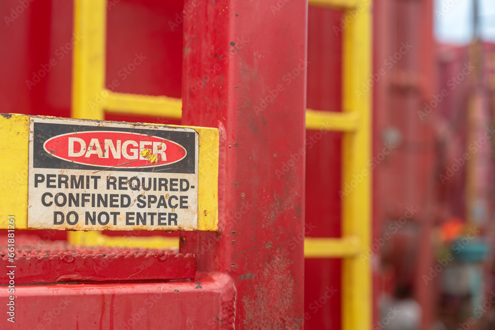 Confined space caution information sign, the work permit was requested ...
