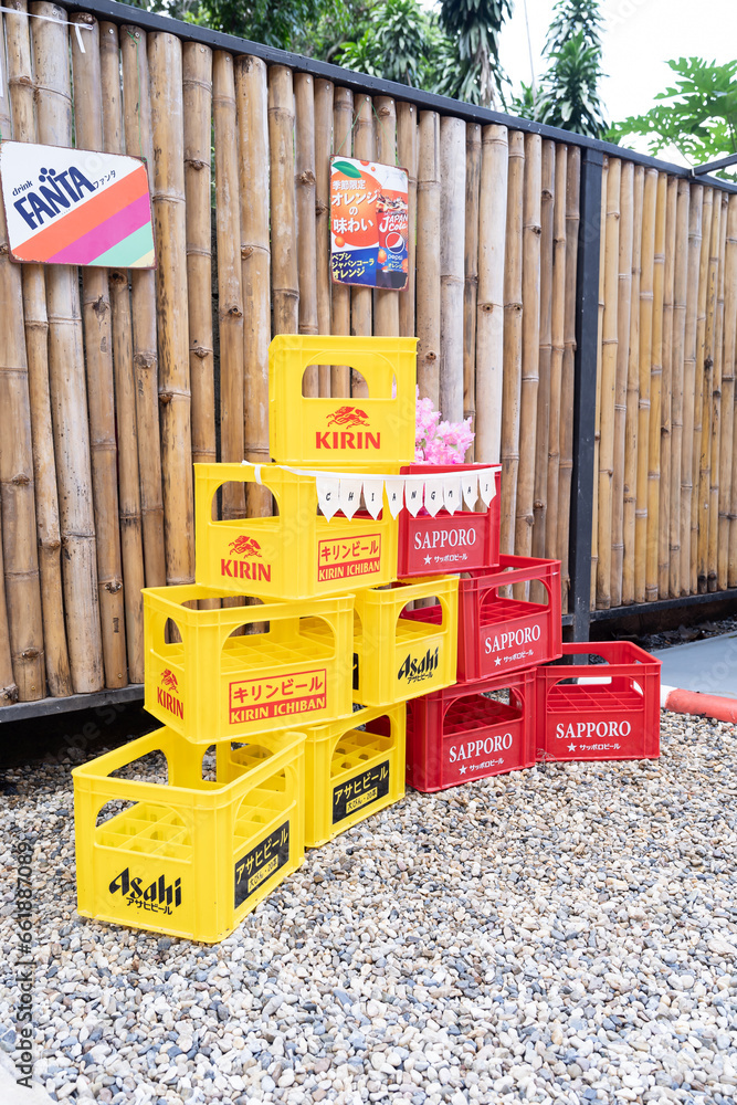 Chiang Mai, Thailand - October 14 2023: Stacks of empty plastic yellow ...