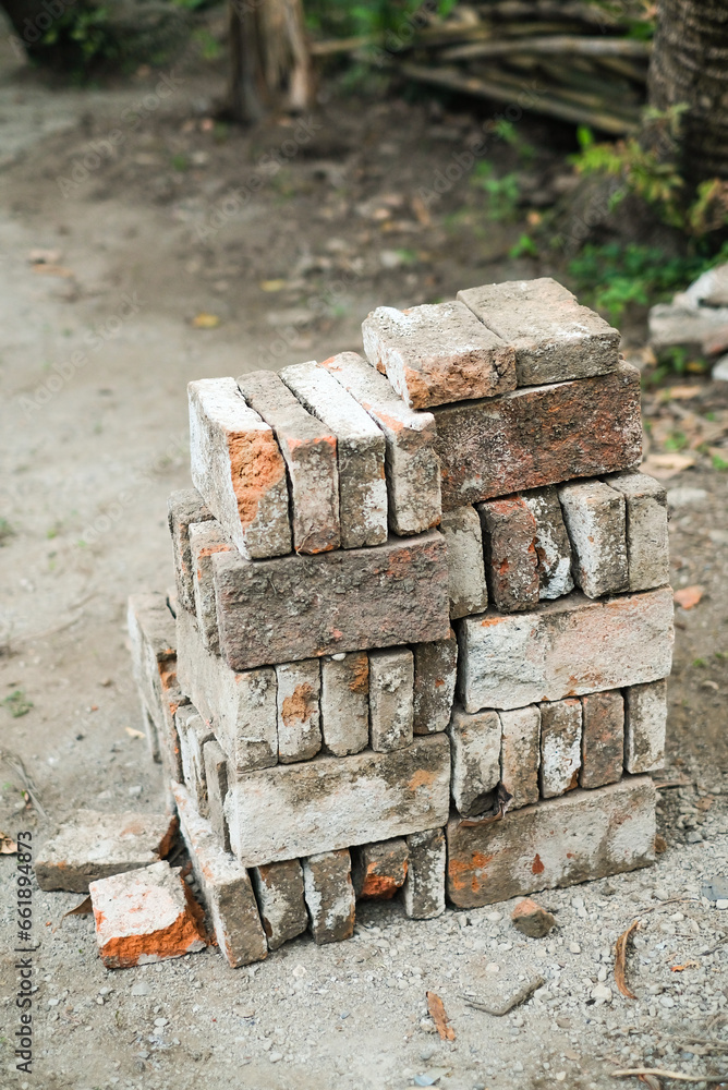 Solid clay brick used for construction, dark red brick. pile of bricks ...