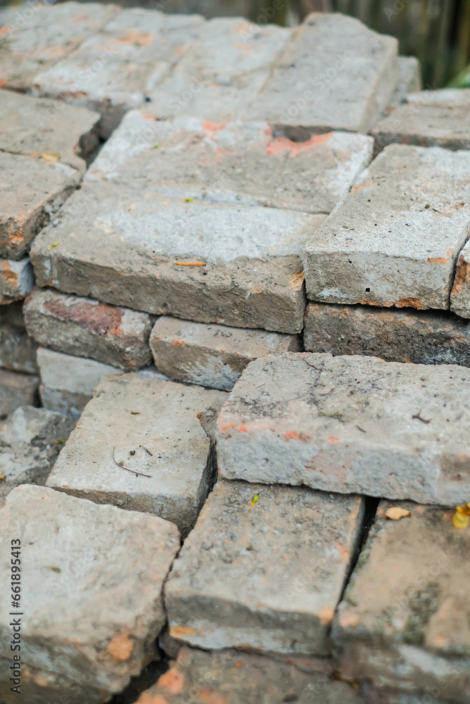 Solid clay brick used for construction, dark red brick. pile of bricks ...