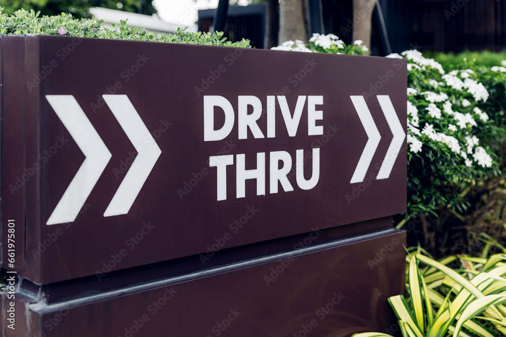 Drive thru sign in fast food restaurant. Drive thru sign into the shop ...
