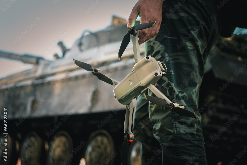 artillery spotter or military observer launches drone into sky force ...
