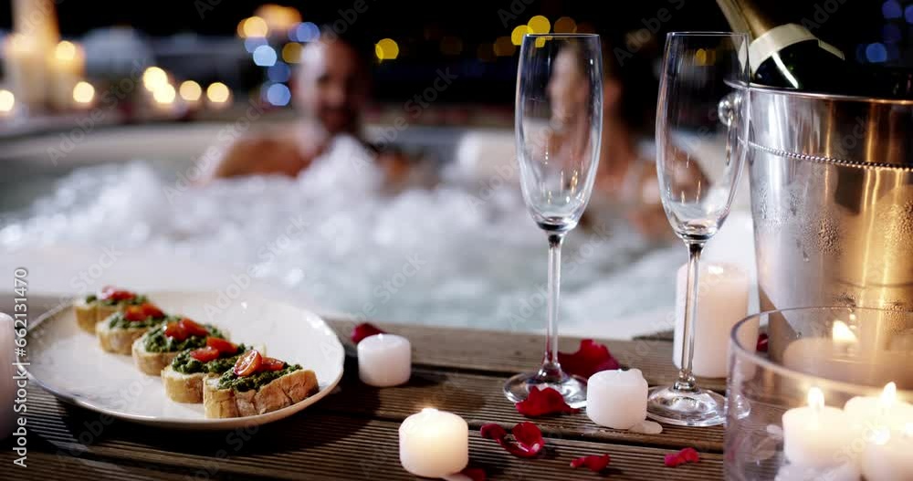 Champagne, food and hot tub couple romance, love and bond on Valentines ...