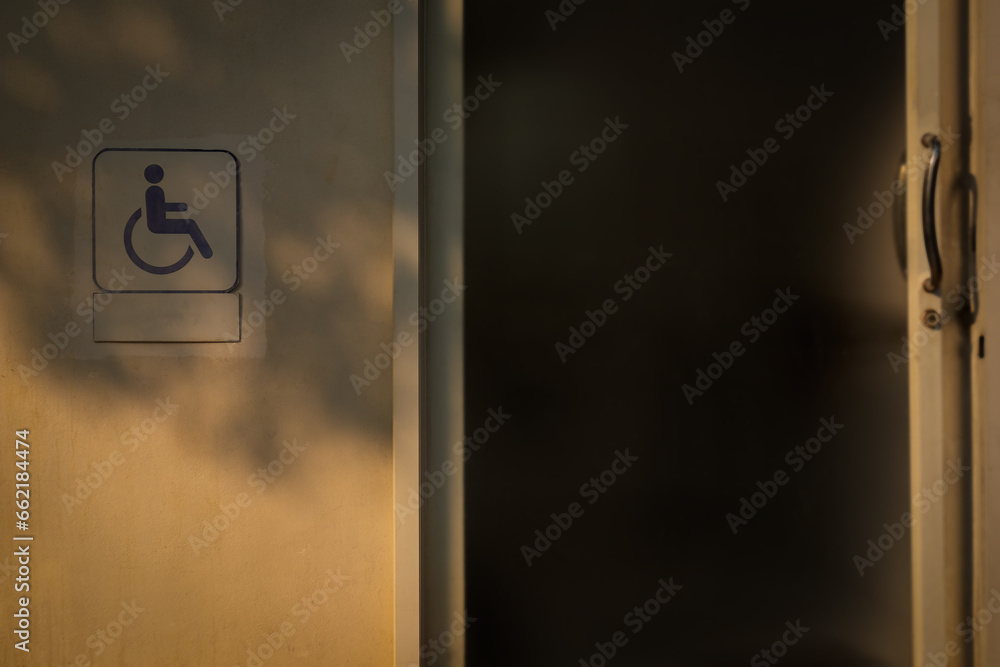 Handicapped or wheelchair symbol shown on exterior old white of the ...