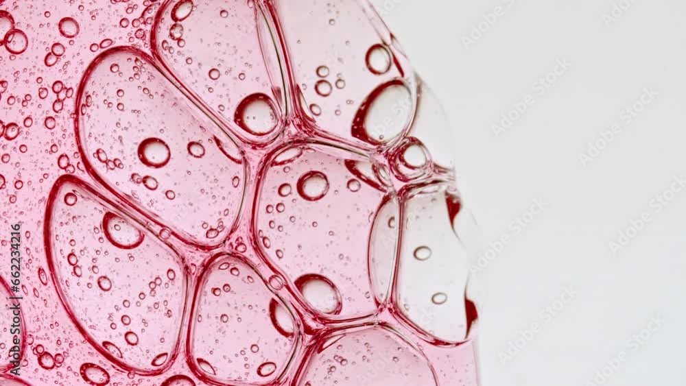 Bubble cluster, cells under a microscope. Transparent cosmetic gel ...