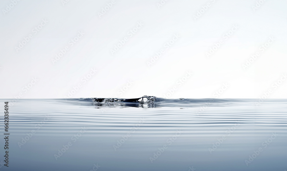 Blurred desaturated transparent clear calm water surface texture with ...