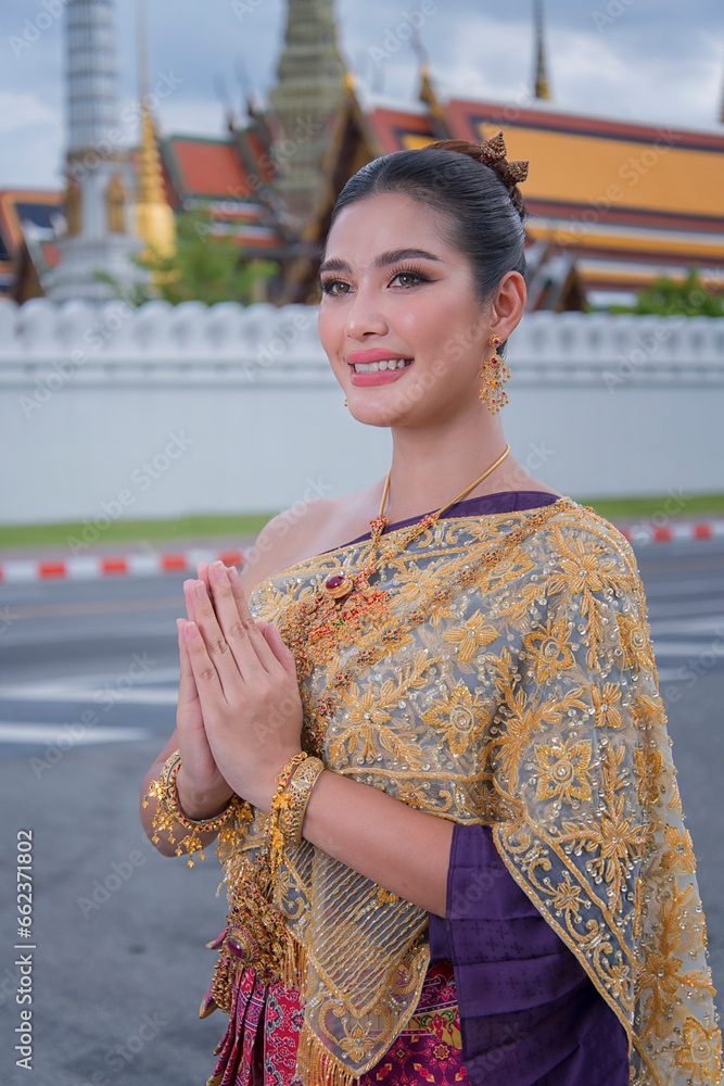woman in clothing. Thai people with temple on background. Female in ...