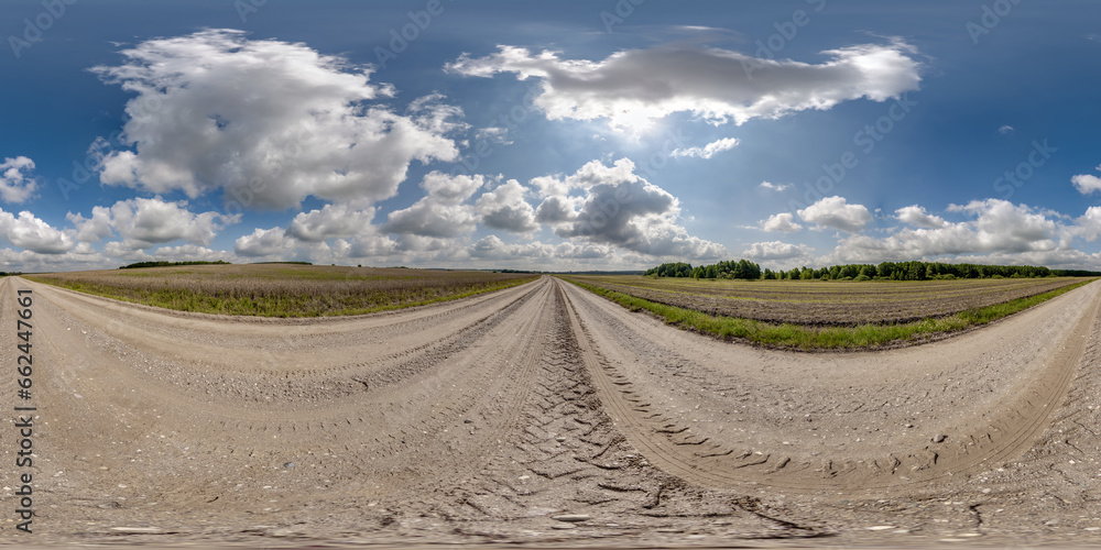 360 hdri panorama on wet gravel road with marks from car or tractor ...