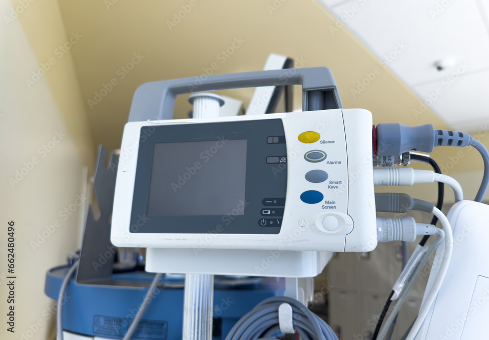 hospital monitor displaying vital signs: heart rate, blood pressure ...