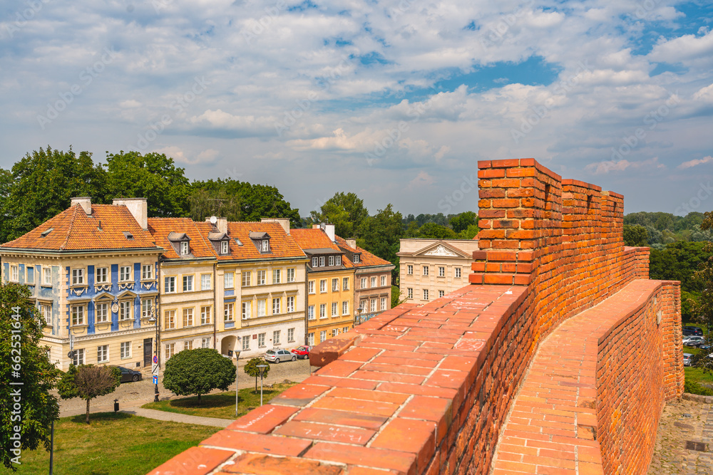 Old Town Warsaw. Towers and red brick walls of the historical Warsaw ...