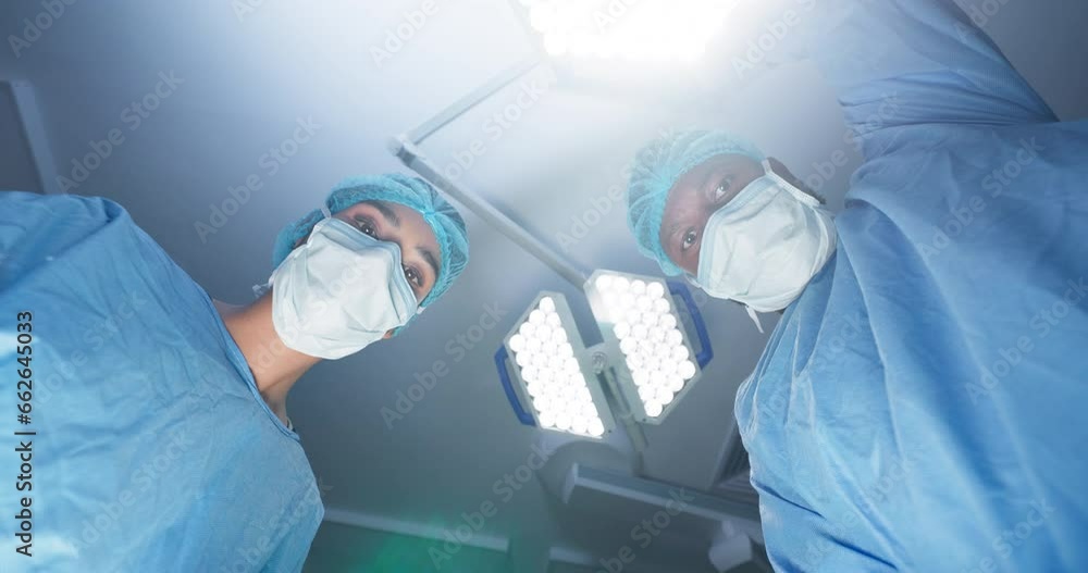 Hospital, doctor and lights for surgery, operating room and setting machine. Operation, medical ...