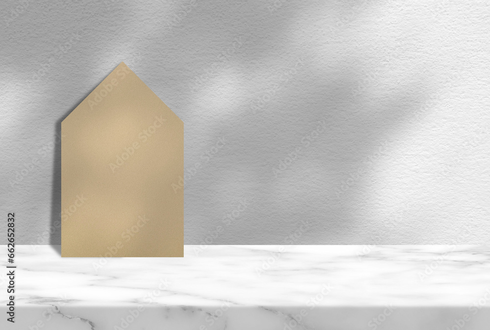 Old Paper House on Marble Table with White Concrete Wall Background ...