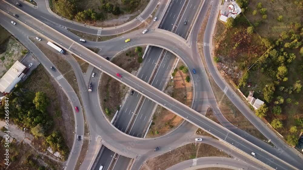 Aerial drone footage of a freeway intersection. Multi level ...